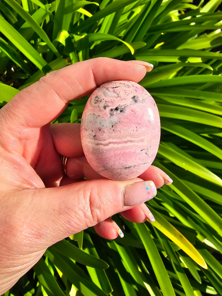 Peruvian Rhodonite Palm Stone – Daughters And Co Crystals